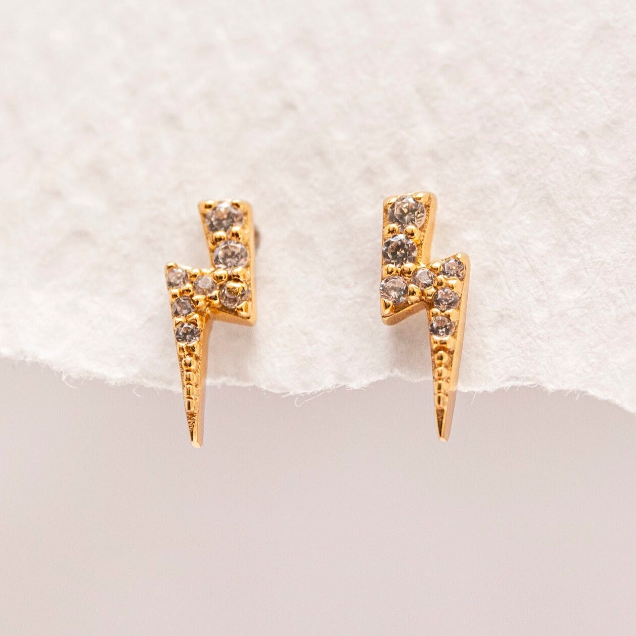 Sparkly Gold Lightning Bolt Stud Earrings – The Revivas